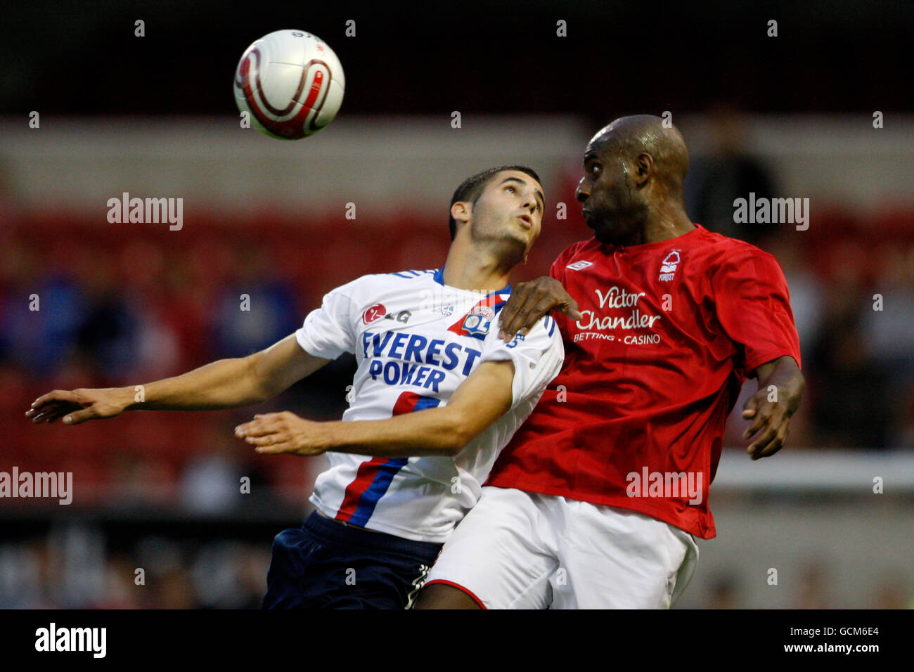 Nottingham Forest's Dele Adebola (right) and Olympique Lyonnais' Maxime ...