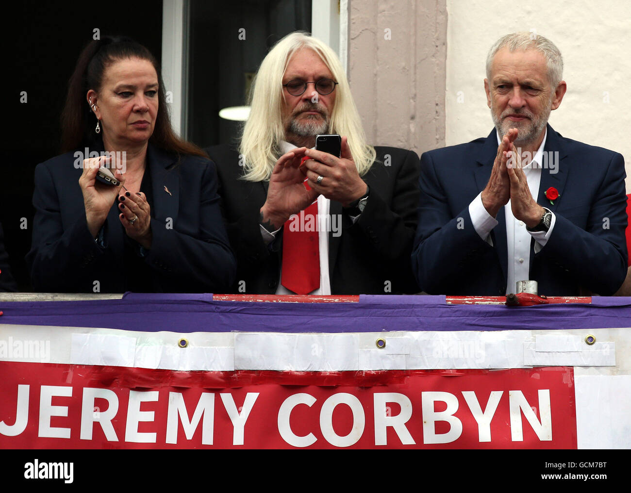 Labour leader Jeremy Corbyn (right) watches as miners head towards the ...