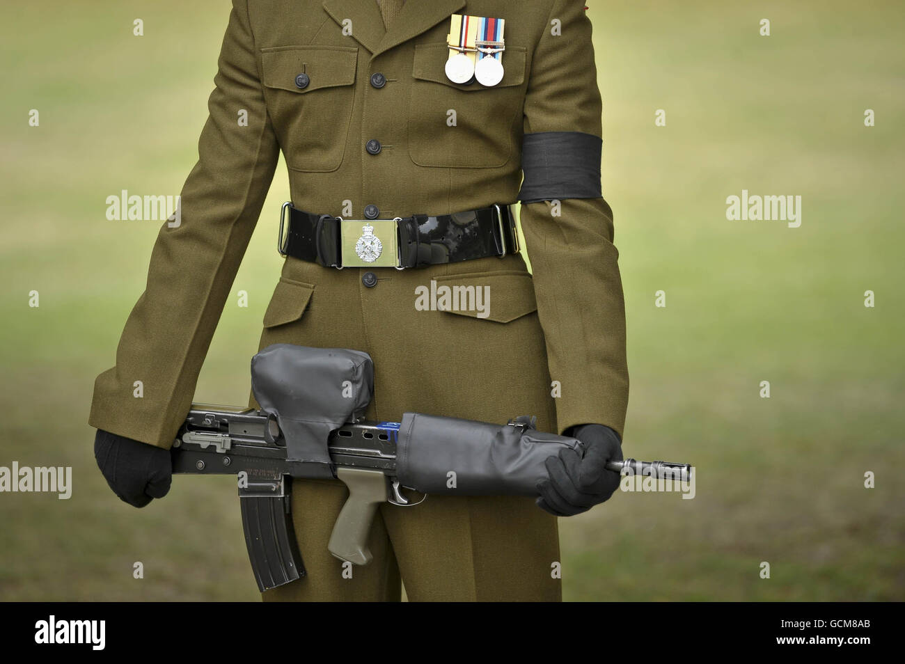 A Honour Guard from the Rifles stands at ease with his ceremonial SA80 ...