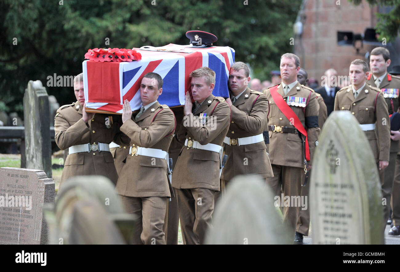 The coffin of Private Alex Isaac is carried from St Mary's Church ...