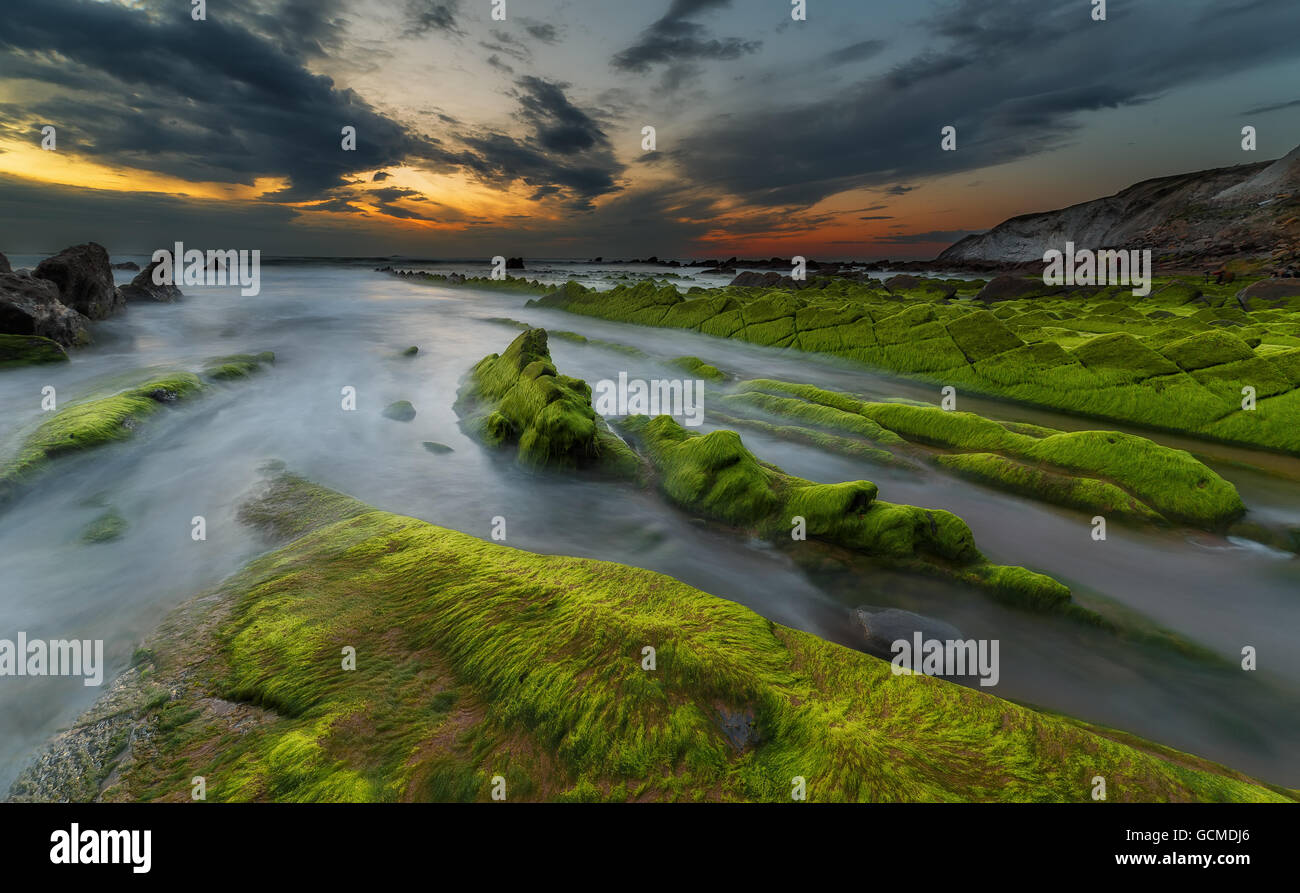 Sunset at Barrika beach Stock Photo - Alamy
