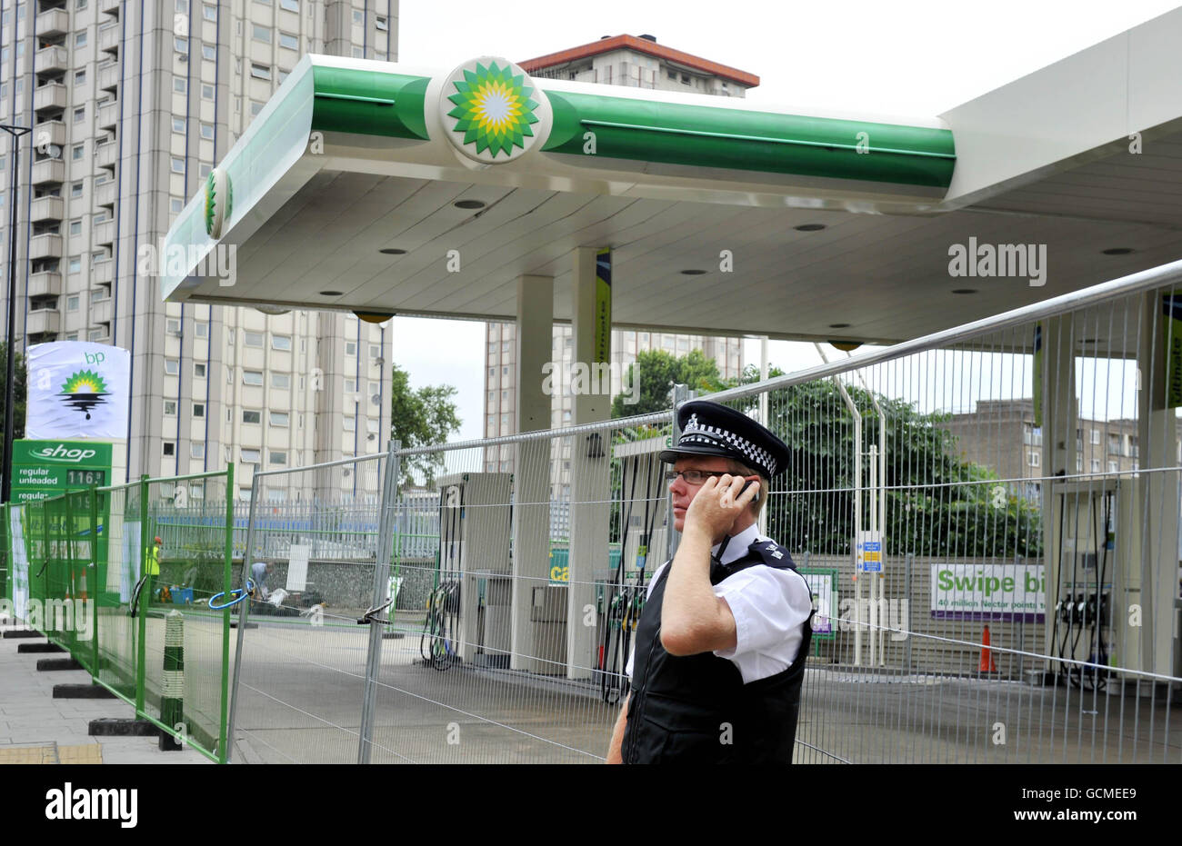 A police officer outside the BP petrol station on Hampstead Road in ...