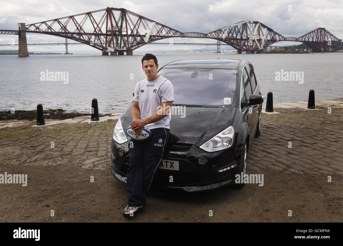 Scotland rugby player Nick De Luca is pictured with a Ford car during a ...