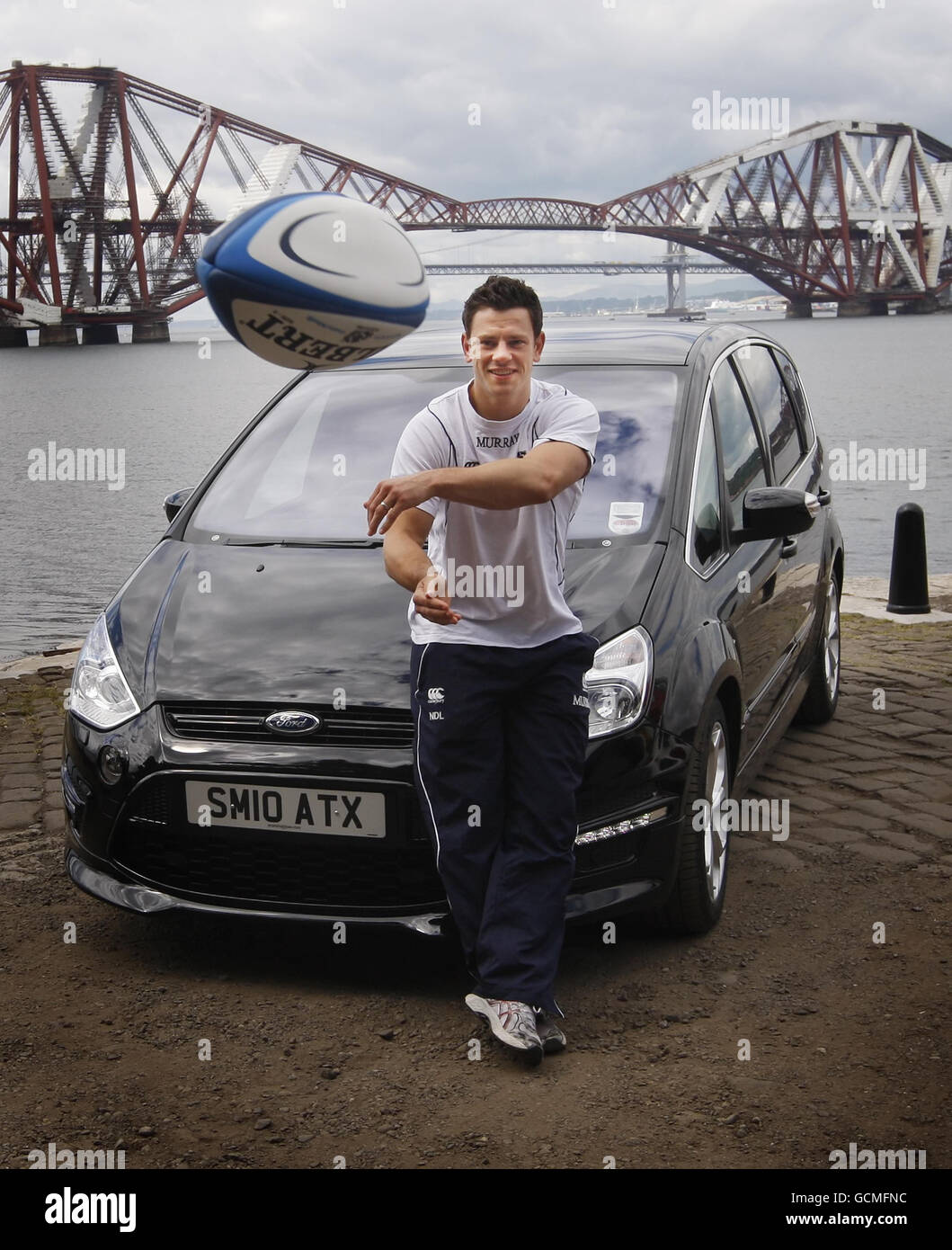 Scotland rugby player Nick De Luca is pictured with a Ford car during a ...