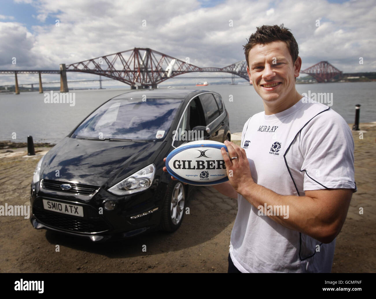 Scotland rugby player Nick De Luca is pictured with a Ford car during a ...