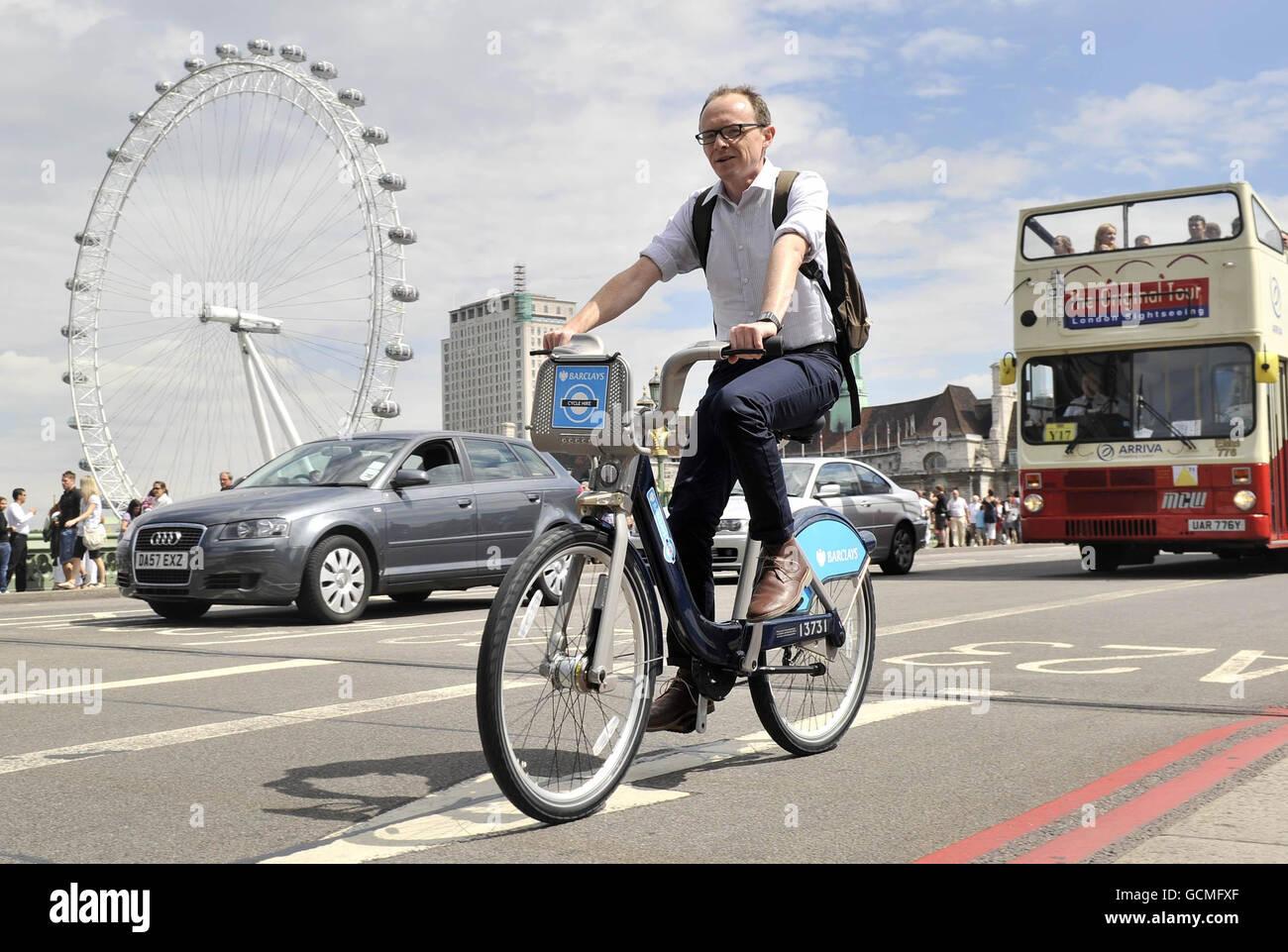 A man rides one of the new cycle hire scheme bikes, launched today by ...