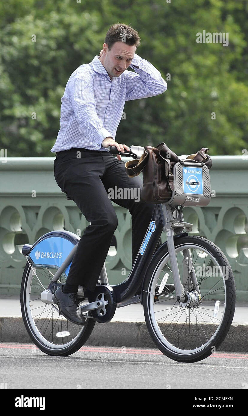 A man rides one of the new cycle hire scheme bikes, launched today by ...