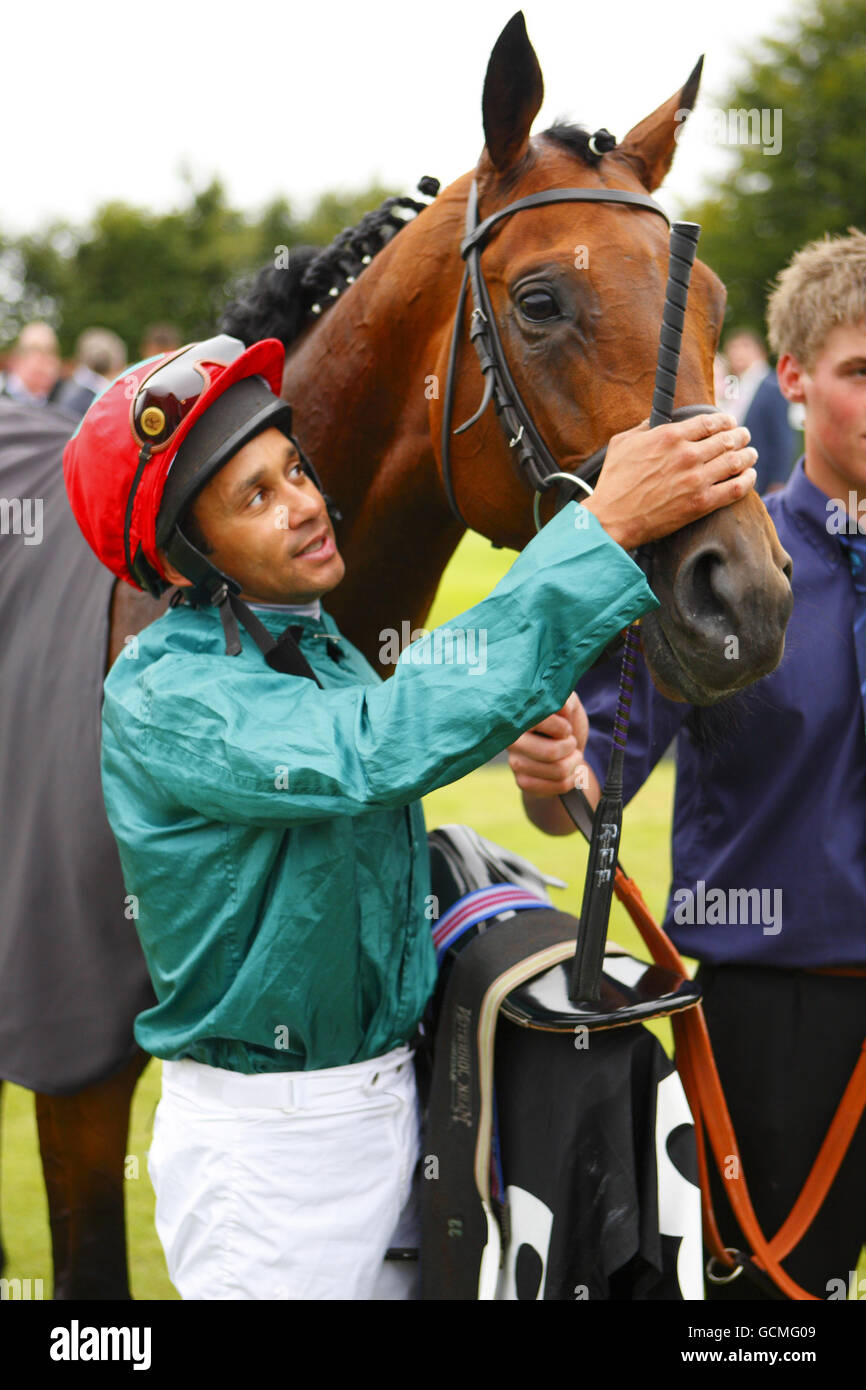 Royston Ffrench pats Sea Lord after winning the totesport Mile Heritage ...