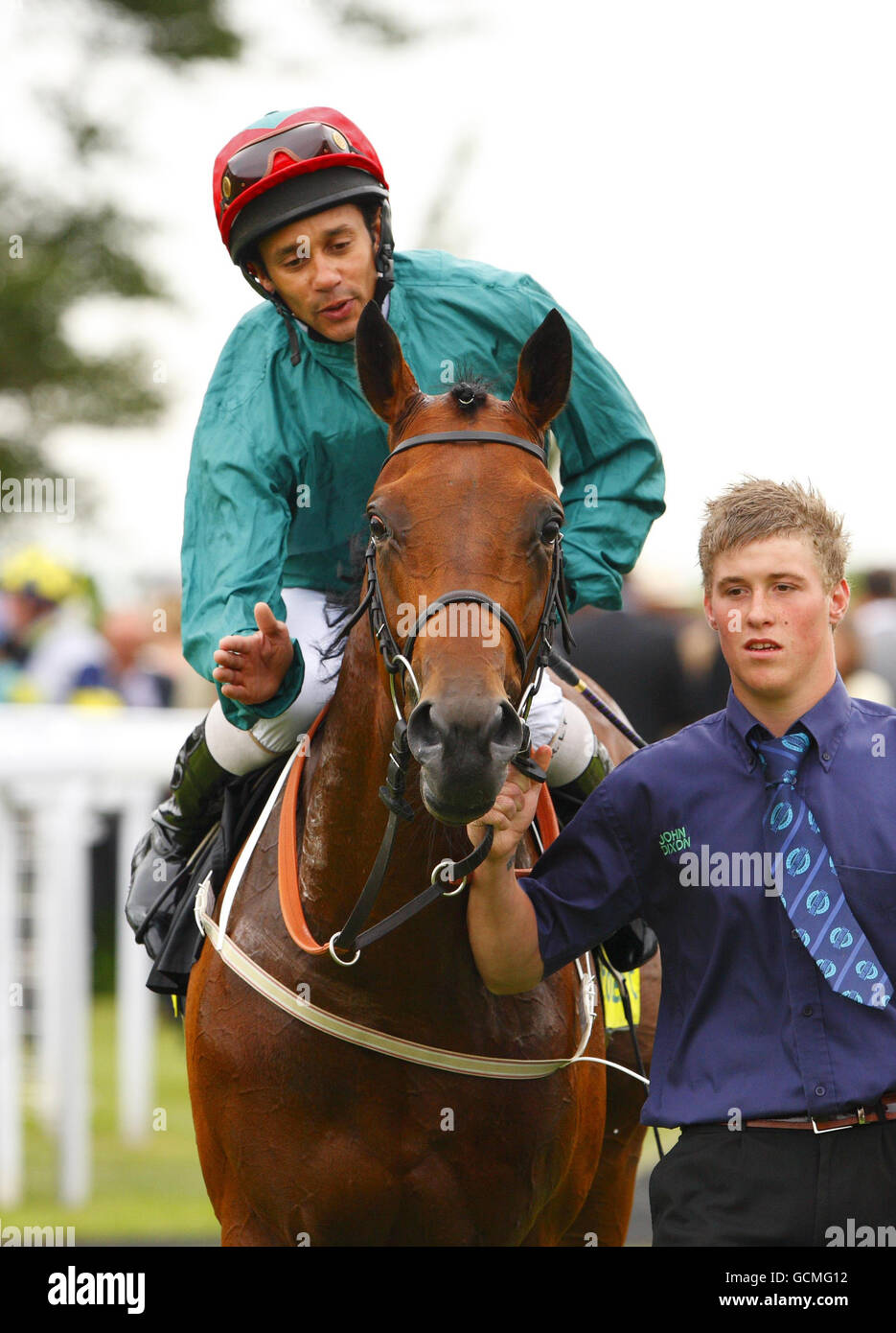 Royston Ffrench pats Sea Lord after winning the totesport Mile Heritage ...