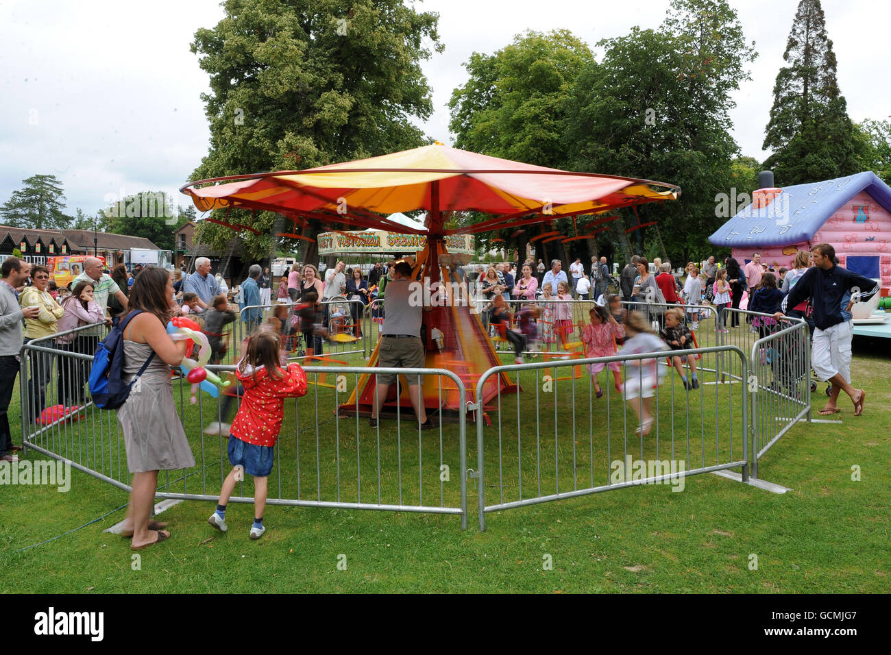 Families enjoy the fairground style entertainment at the 'Family Fun ...