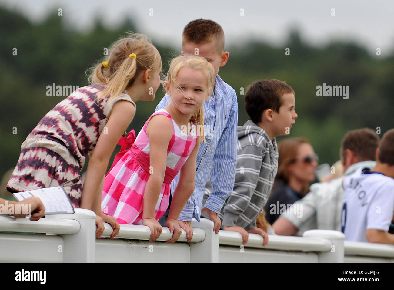 Children enjoying the racing on 'Family Fun Race Day' Stock Photo - Alamy