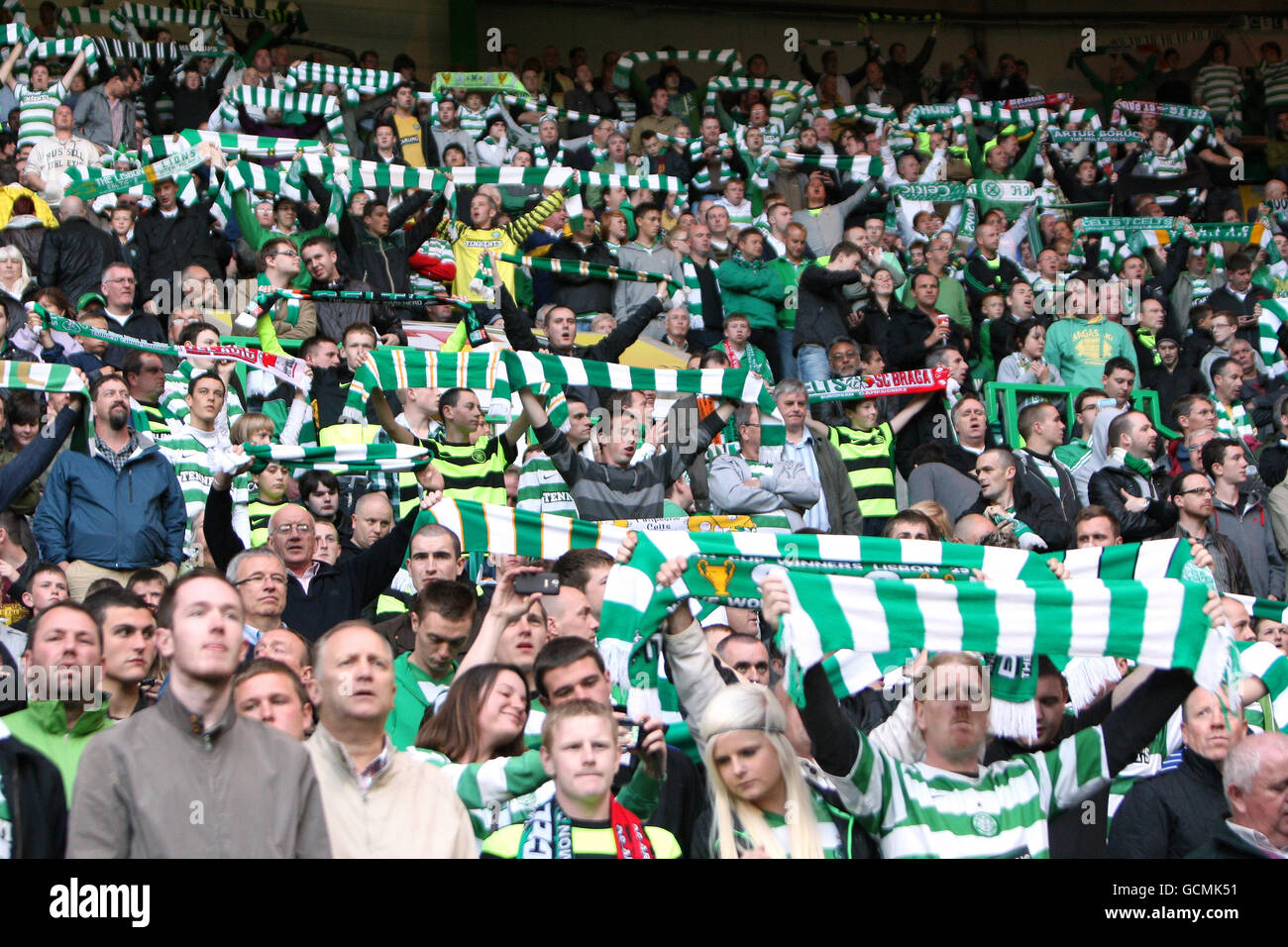 Celtic fans show there support in the stands hi-res stock photography ...