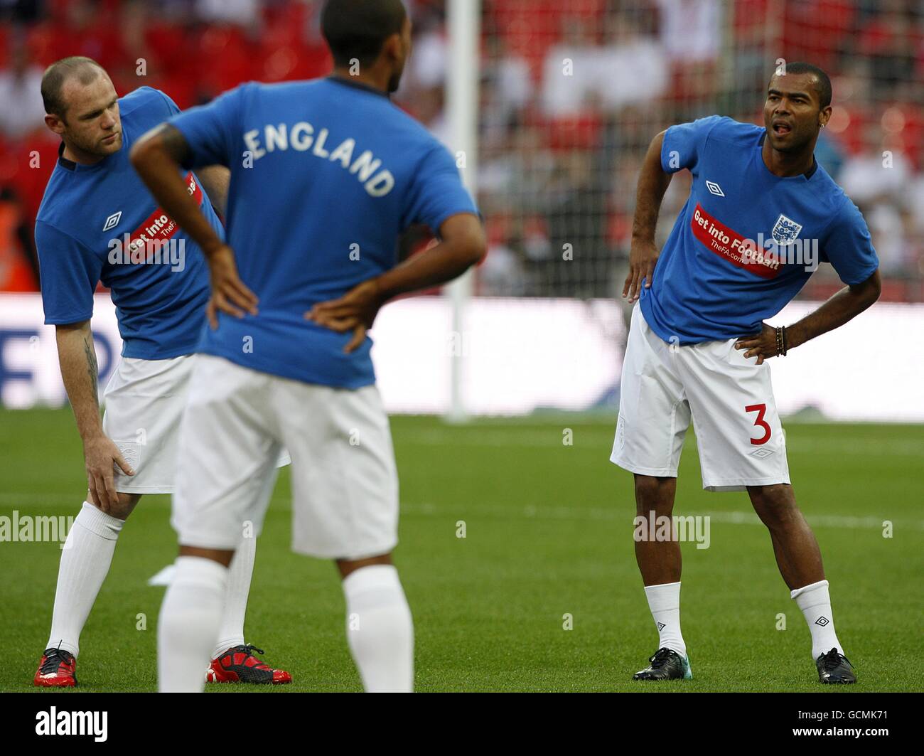(left to right) England's Wayne Rooney, Theo Walcott and Ashley Cole ...