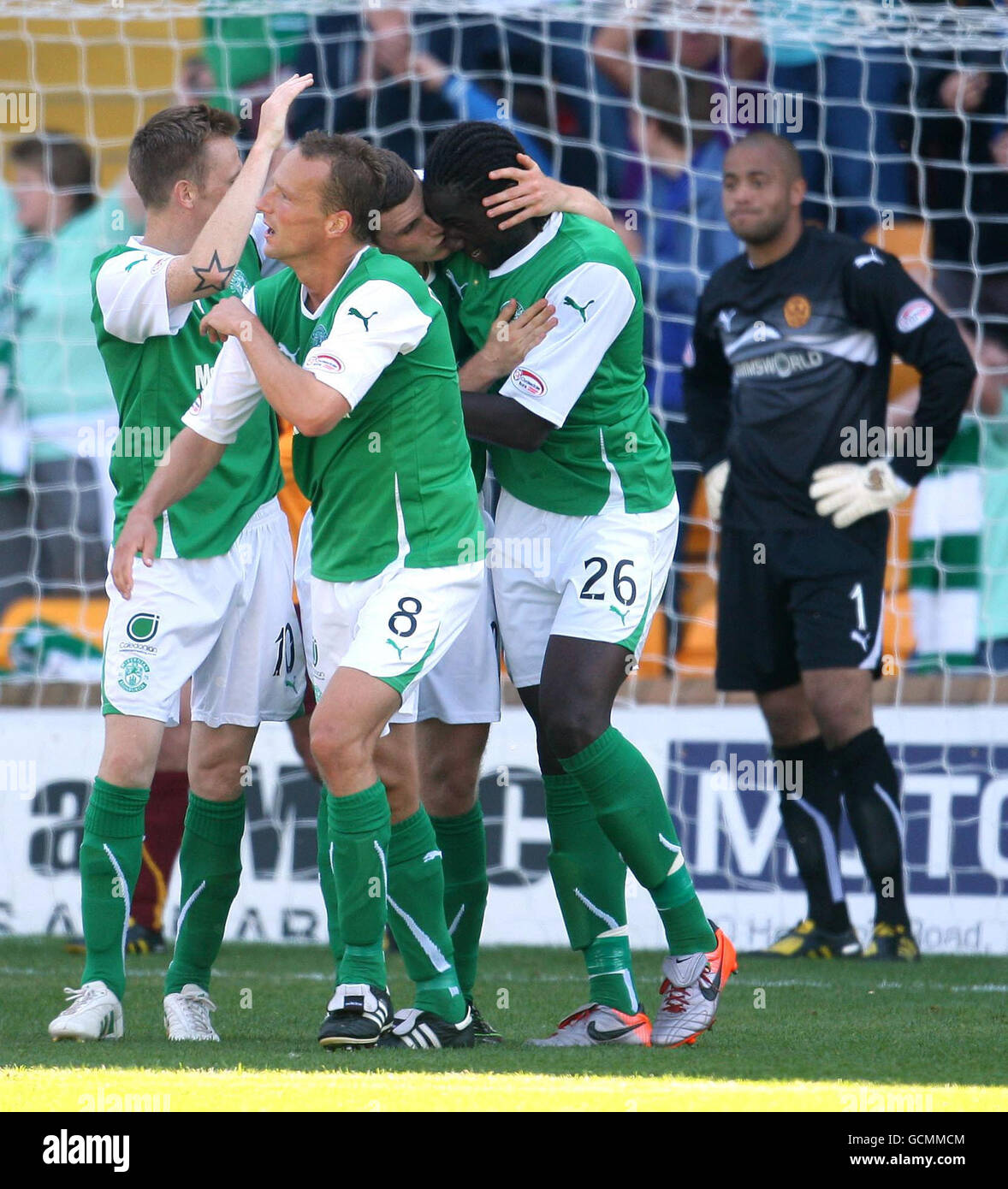 Hibernian's Paul Hanlon (centre) celebrates scoring their second goal ...