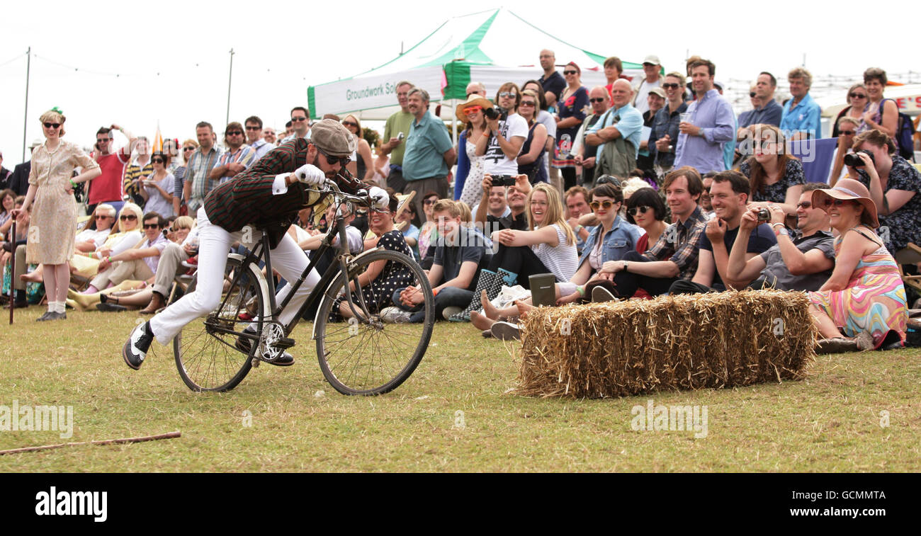 Festival goers taking part in the Chap Olympics, during Vintage At ...