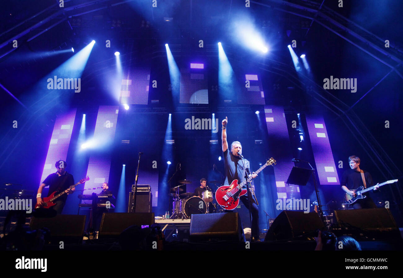 Peter Hook (centre left) on the Main Stage during Vintage At Goodwood ...