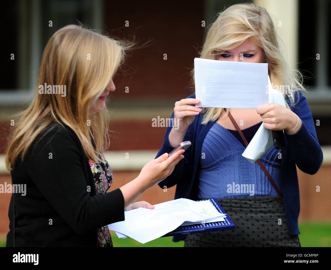 Two unnamed pupils check a level results loughborough high school girls ...