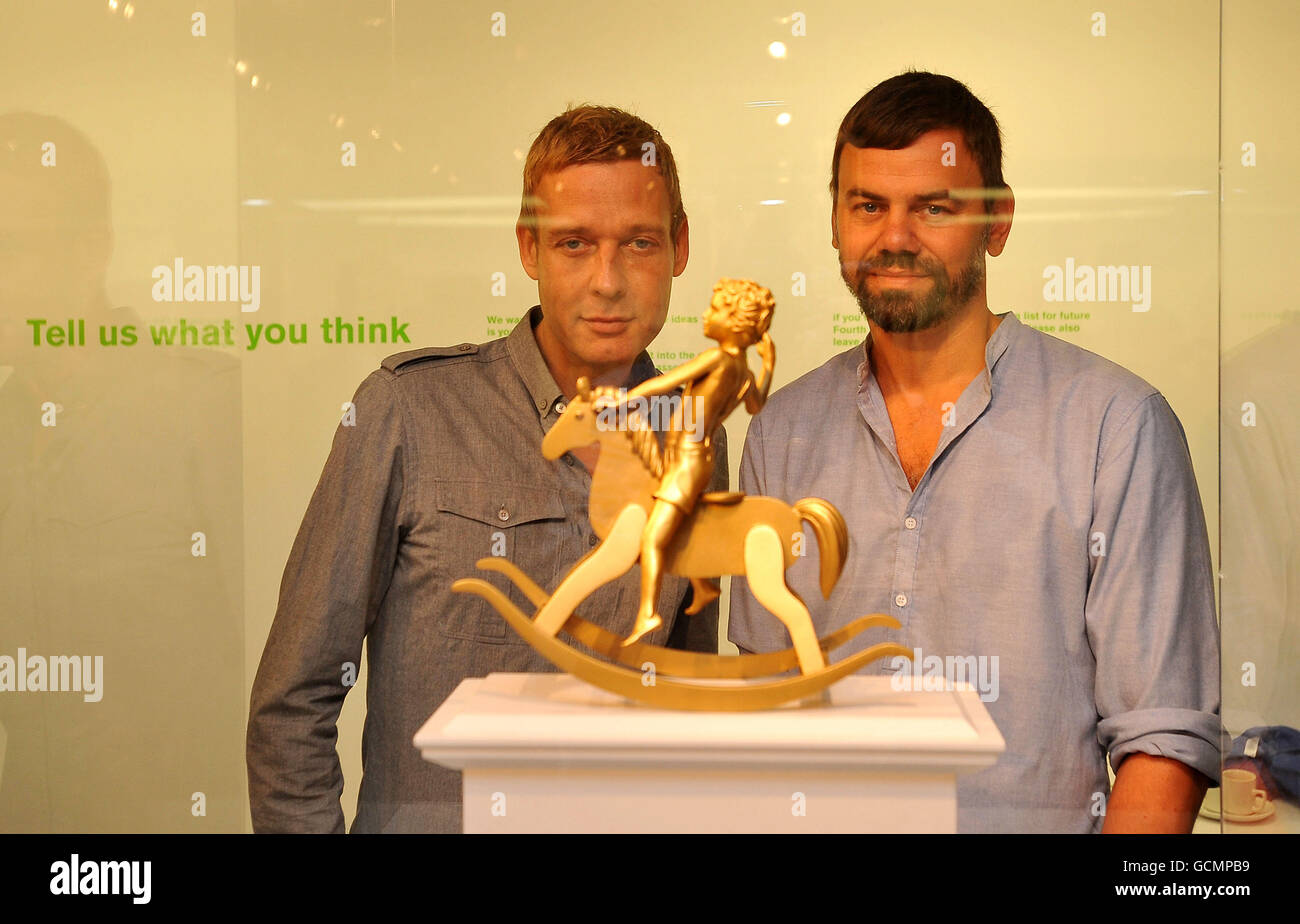 Artists Michael Elmgreen (left), and Ingar Dragset, with their artwork ...