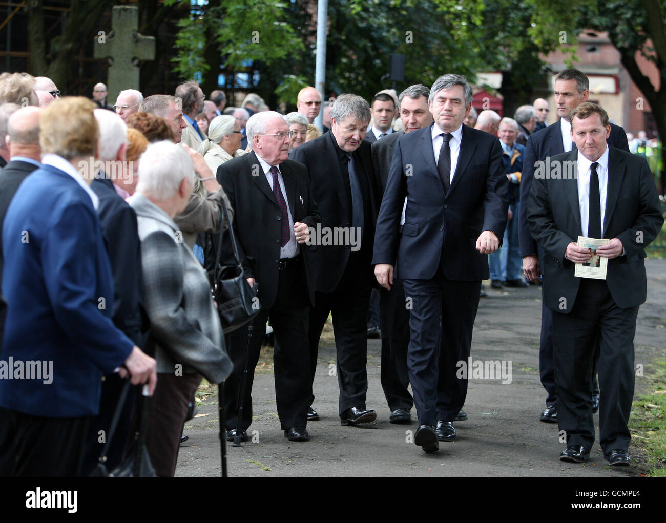 Former Prime Minister Gordon Brown (centre), with his brother John (3rd ...