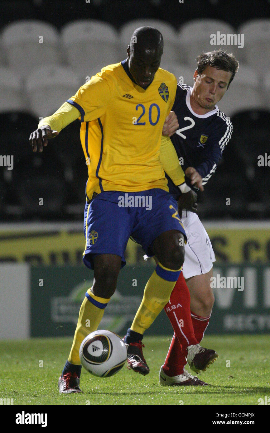 Scotland's Jason Marr (right) and Sweden's Joe Sise (left) battle for ...