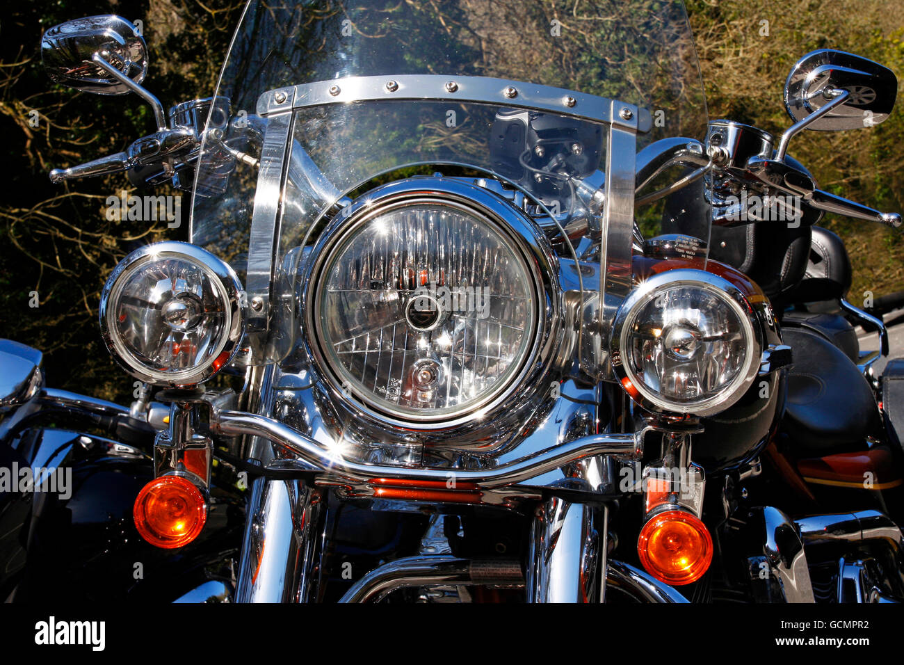 Front view of a classic motorcycle headlamp and screen Stock Photo - Alamy