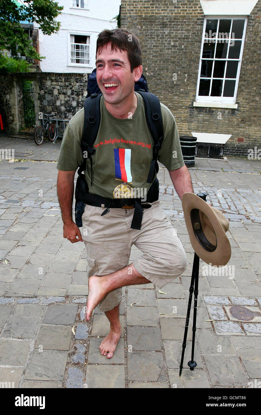 Barefoot charity trek Stock Photo - Alamy