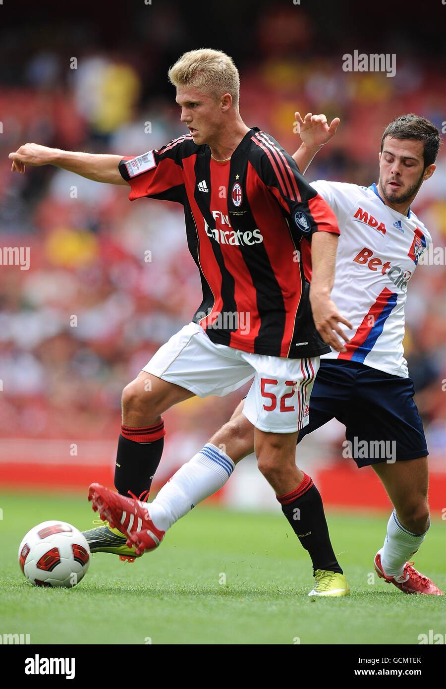 Olympique Lyonnais' Miralem Pjanic (right) and AC Milan's Alexander ...