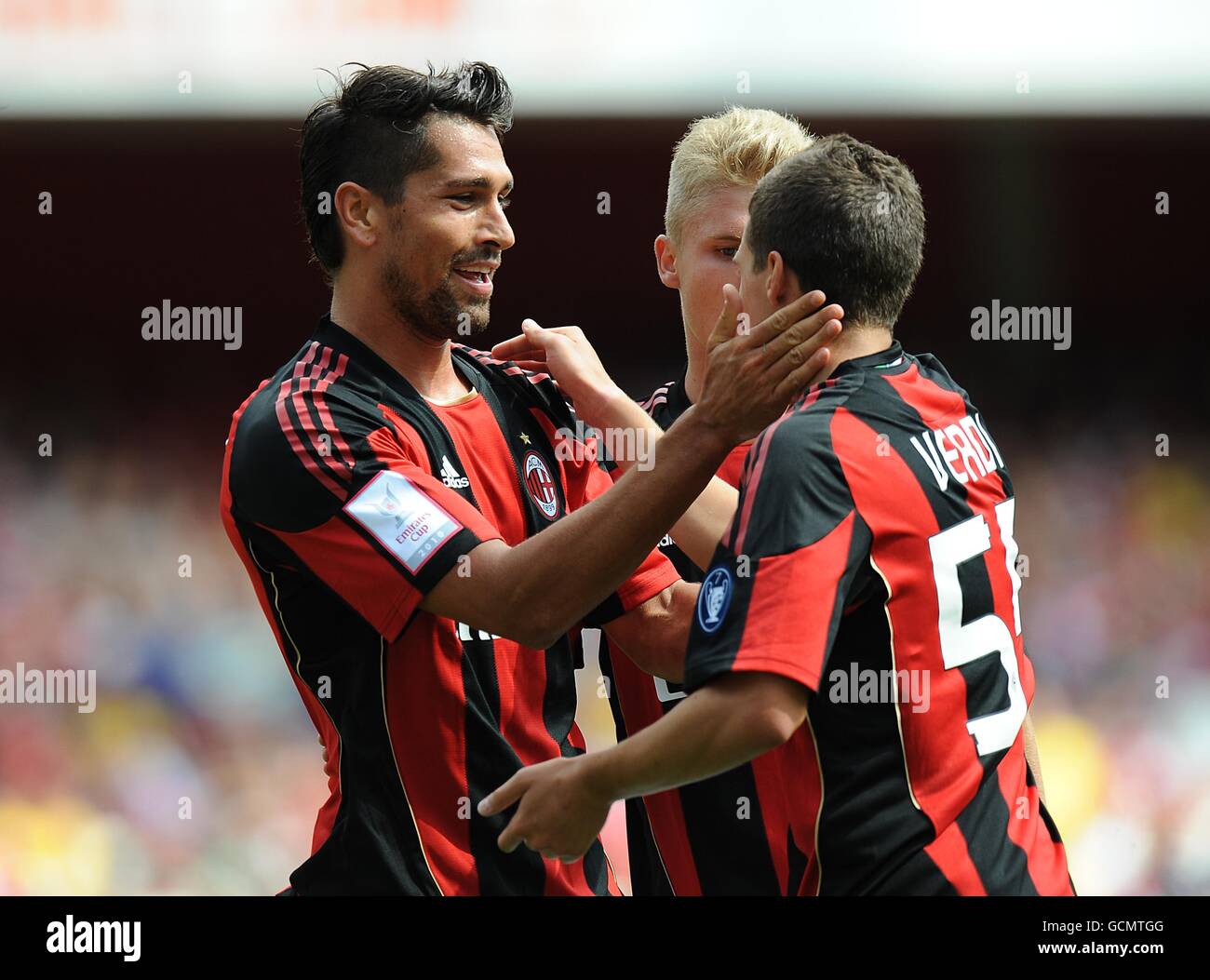 AC Milan's Marco Borriello (left) celebrates scoring his sides first ...