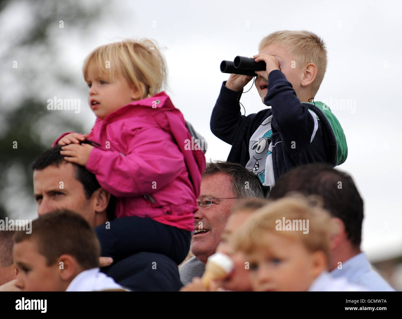 Children enjoying the racing on 'Family Fun Race Day' Stock Photo - Alamy