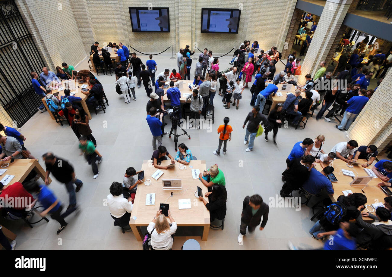Customers inside the new Apple store in London's Covent Garden today ...