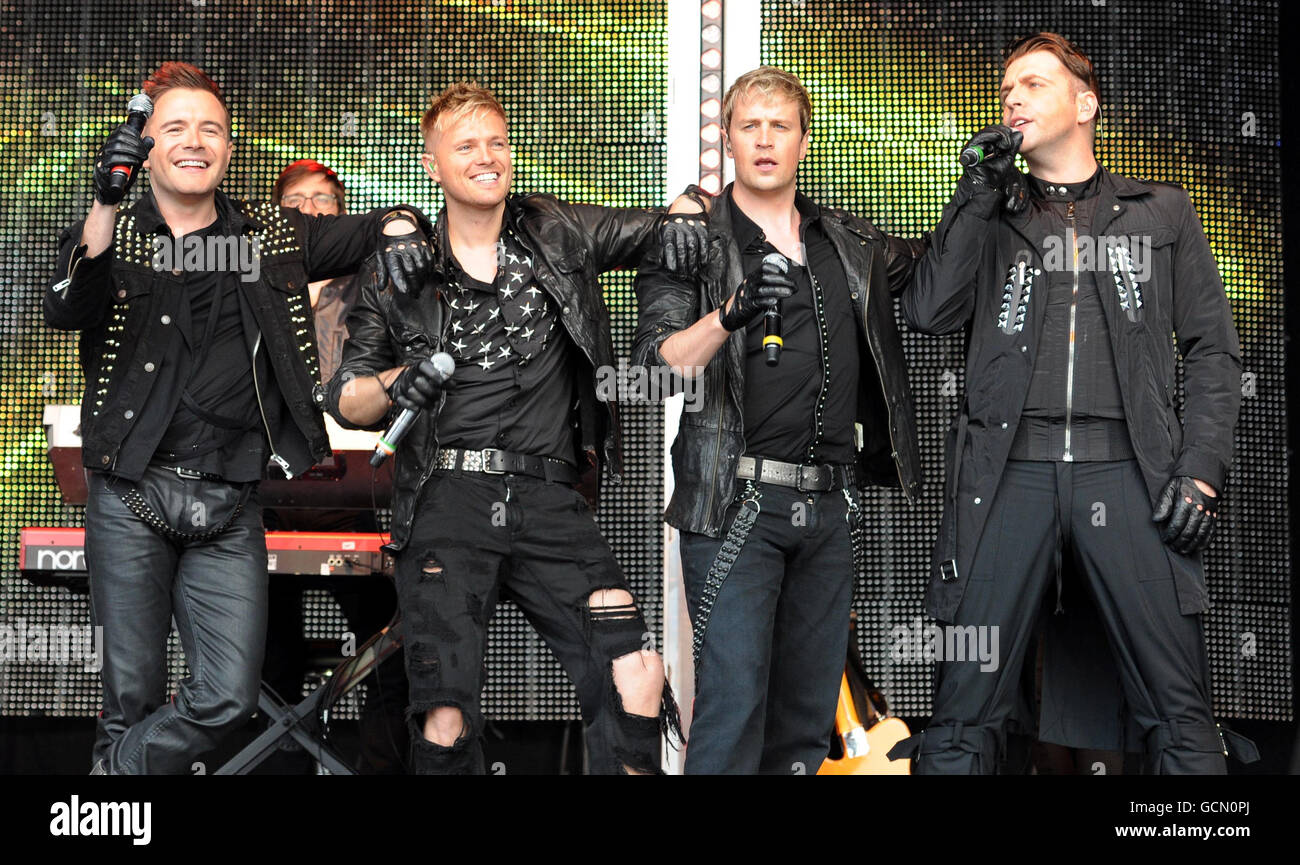 Westlife perform on stage during Ladies Day at Newbury Races, Berkshire ...