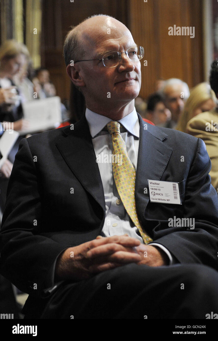 David Willetts MP at the RICS in Westminster, London, listens as Deputy ...