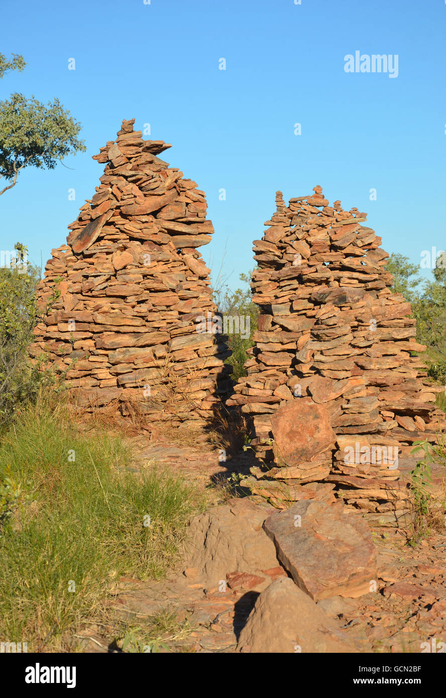 Rock cairns (man-made stone stacks) under blue skies in outback ...