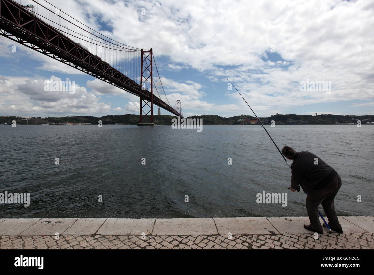 the Bridge Ponte 25 de Abril in Belem in the city centre of Lisbon in ...
