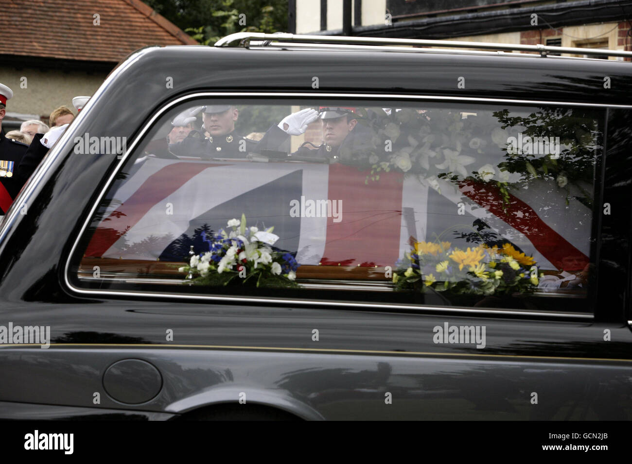The coffin of Marine Adam Brown at his funeral service at St Peter's ...