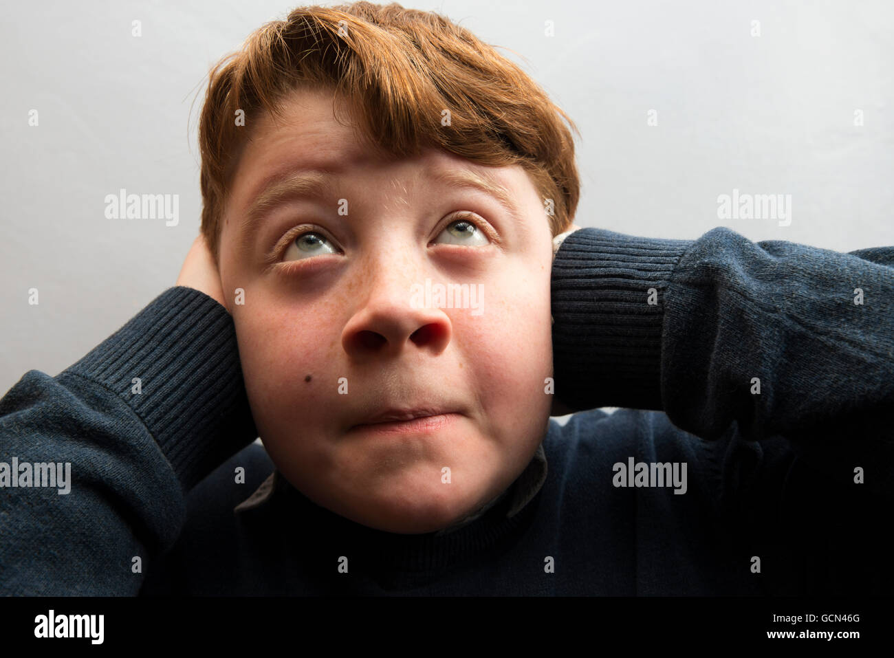 Hands over ears hi-res stock photography and images - Alamy