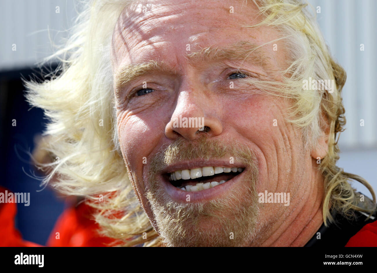 Sir Richard Branson talks to reporters in Dungeness, Kent, after his ...