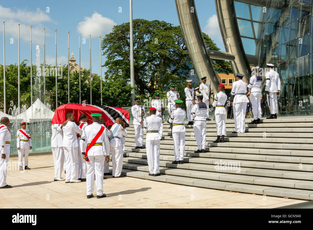 Soldiers carry the casket bearing former prime minister Patrick Manning ...