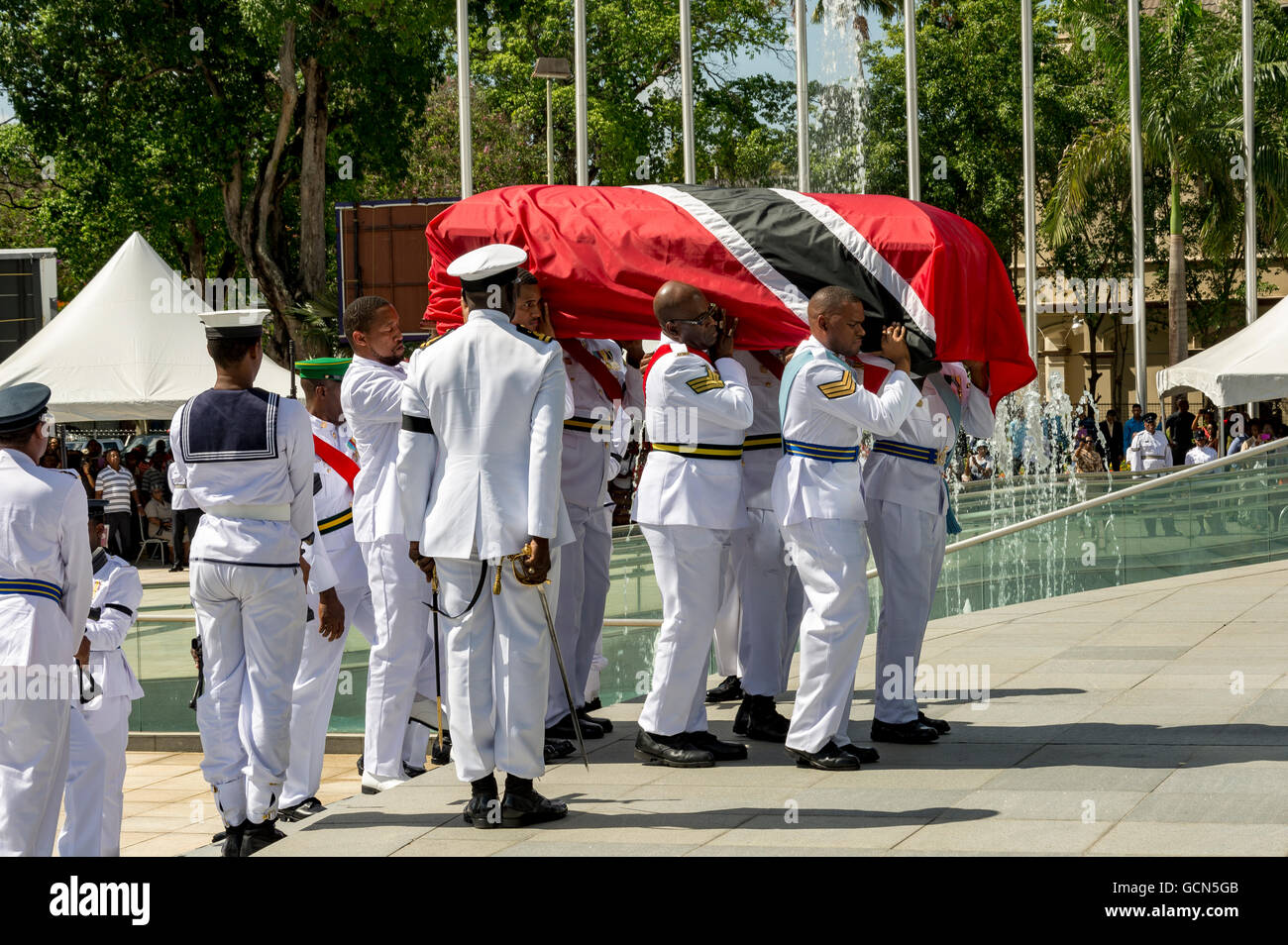 Soldiers carry the casket bearing former prime minister Patrick Manning ...