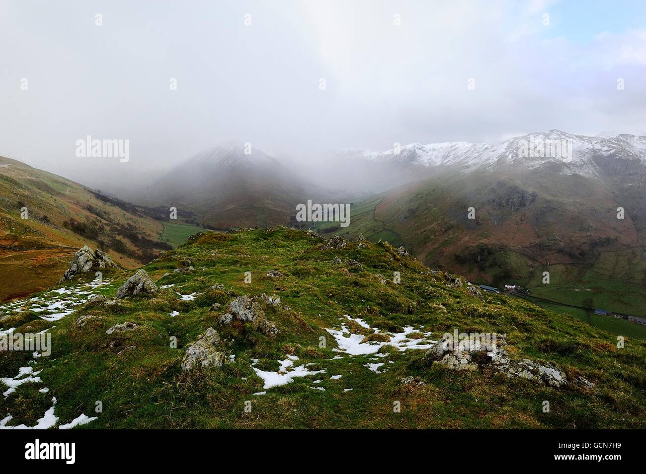 Snow and mist on the Northern Fells Stock Photo - Alamy