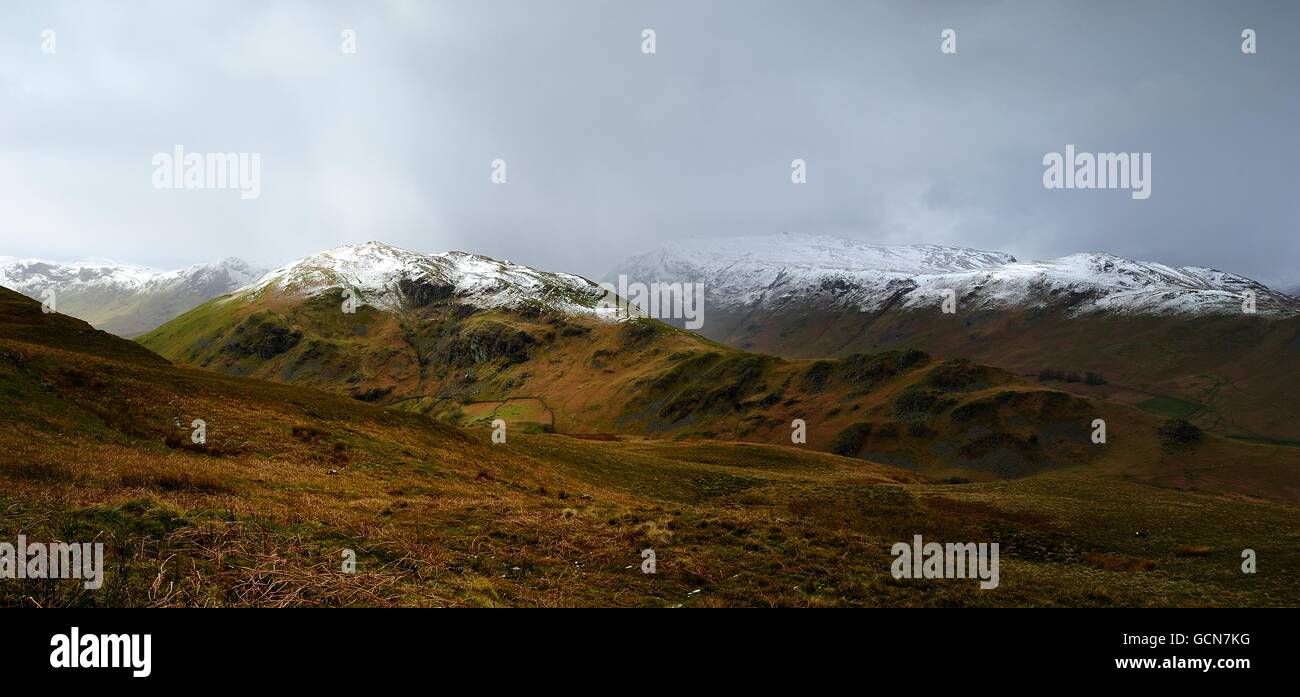 Snow and mist on the Northern Fells Stock Photo - Alamy