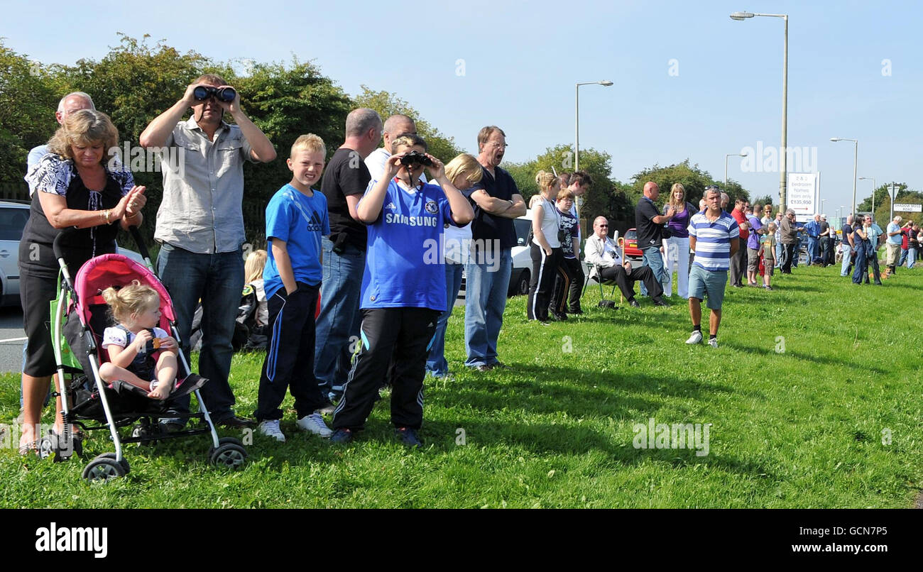 A crowd gathers to watch an Emirates Airbus A380 comes into land at ...