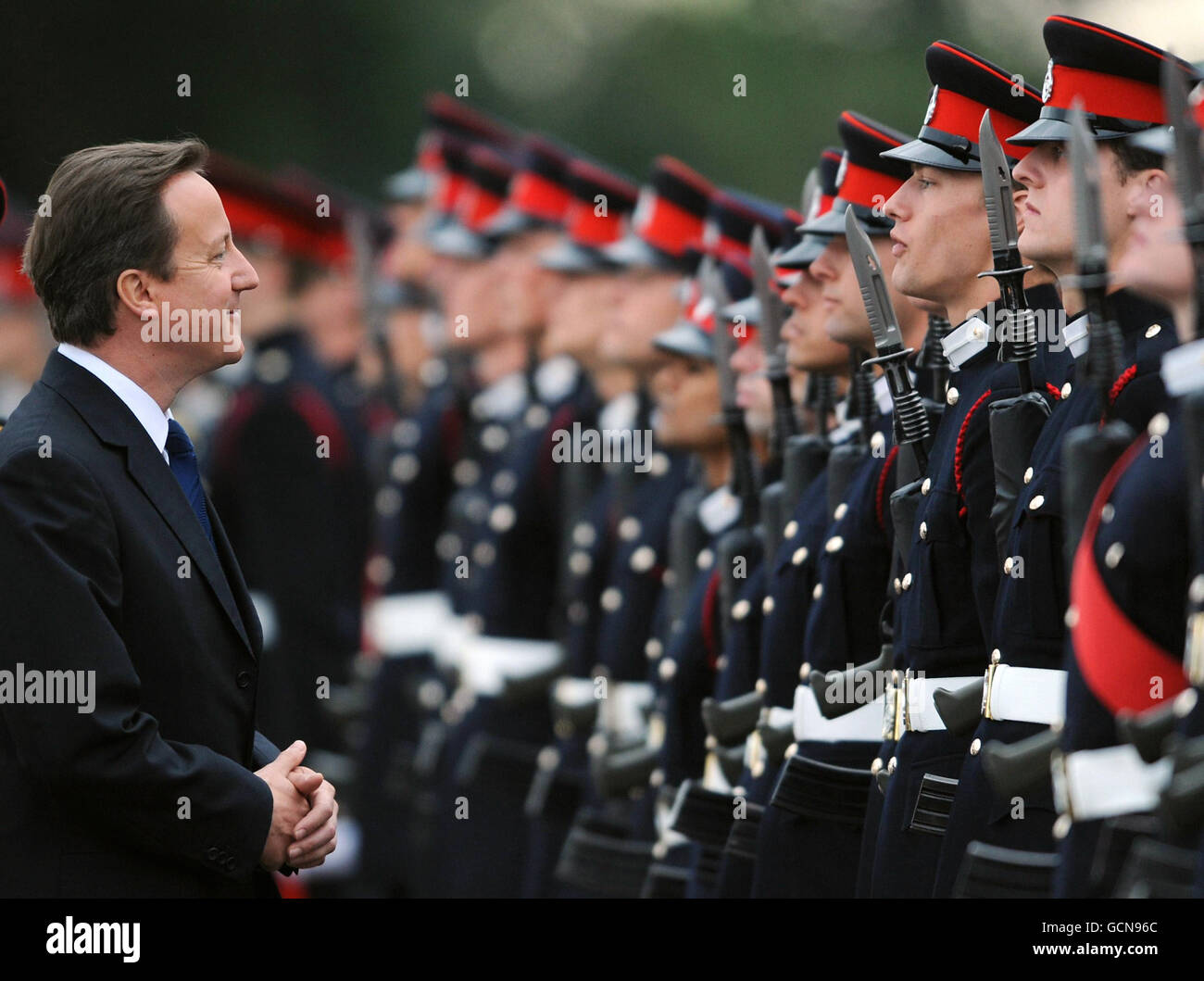 Prime Minister David Cameron inspects Officer Cadets during their ...