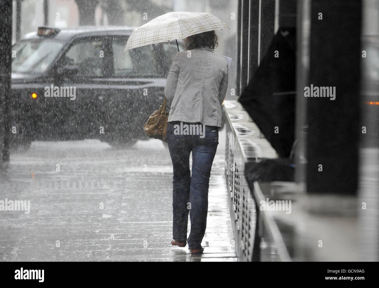 Weather rain stand alone photo back view walking umbrella mangis hi-res ...