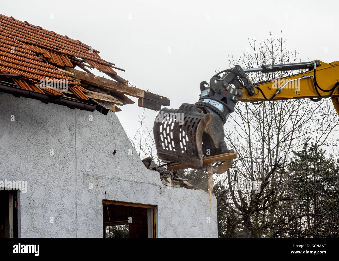 Excavator demolishing house bavaria hi-res stock photography and images ...