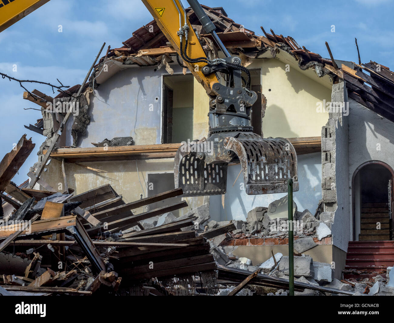 Excavator demolishing house bavaria hi-res stock photography and images ...