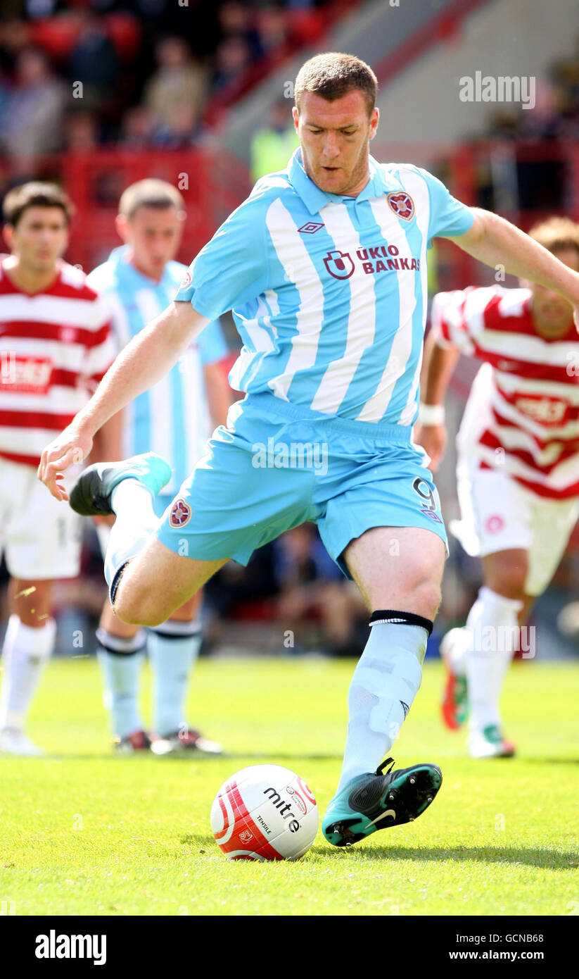 Hearts' Kevin Kyle scores his sides third goal from the penalty spot ...