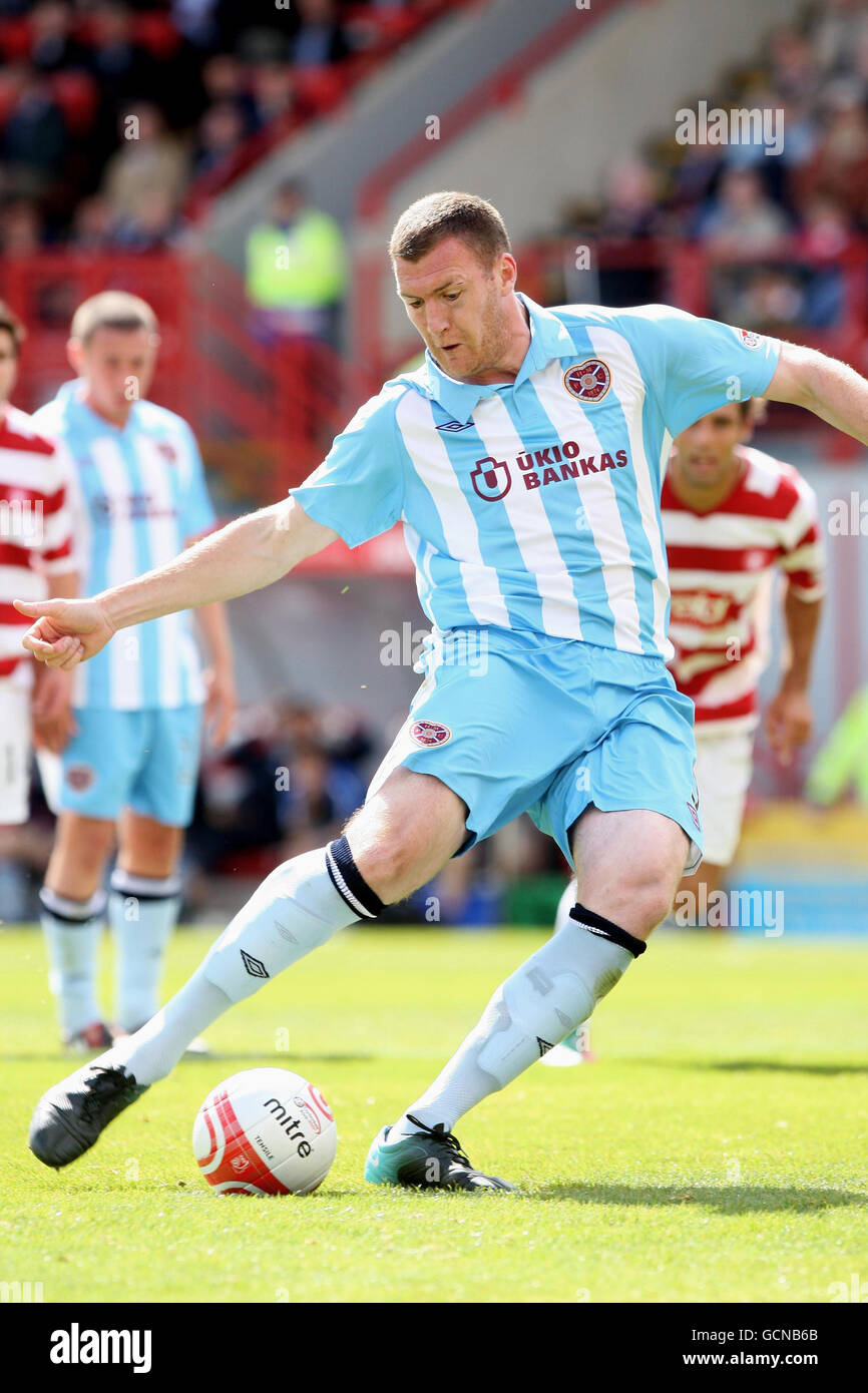 Hearts' Kevin Kyle scores his sides third goal from the penalty spot ...