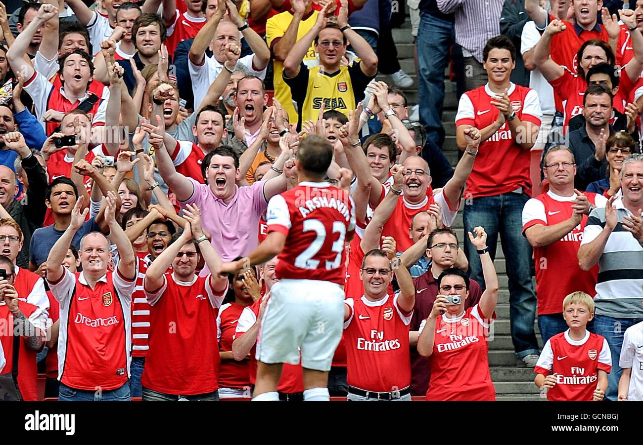 Arsenal's Andrey Arshavin celebrates scoring his side's second goal ...