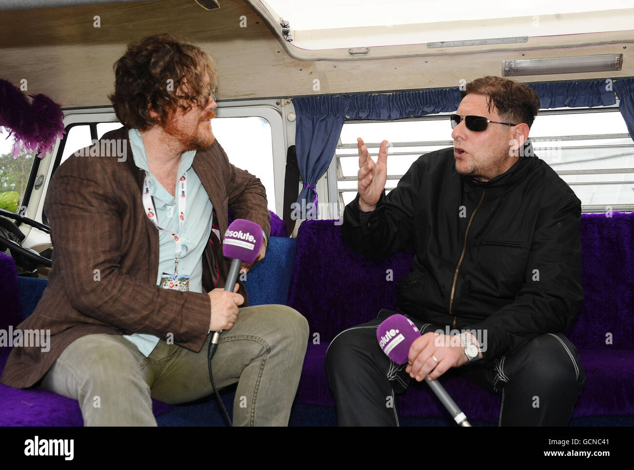Geoff Lloyd (left) speaks to Sean Ryder backstage at the Absolute Radio ...